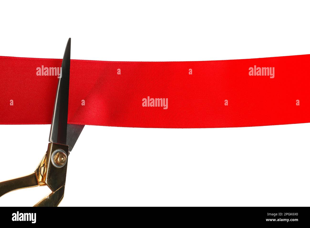Cutting red ribbon with scissors on white background Stock Photo - Alamy