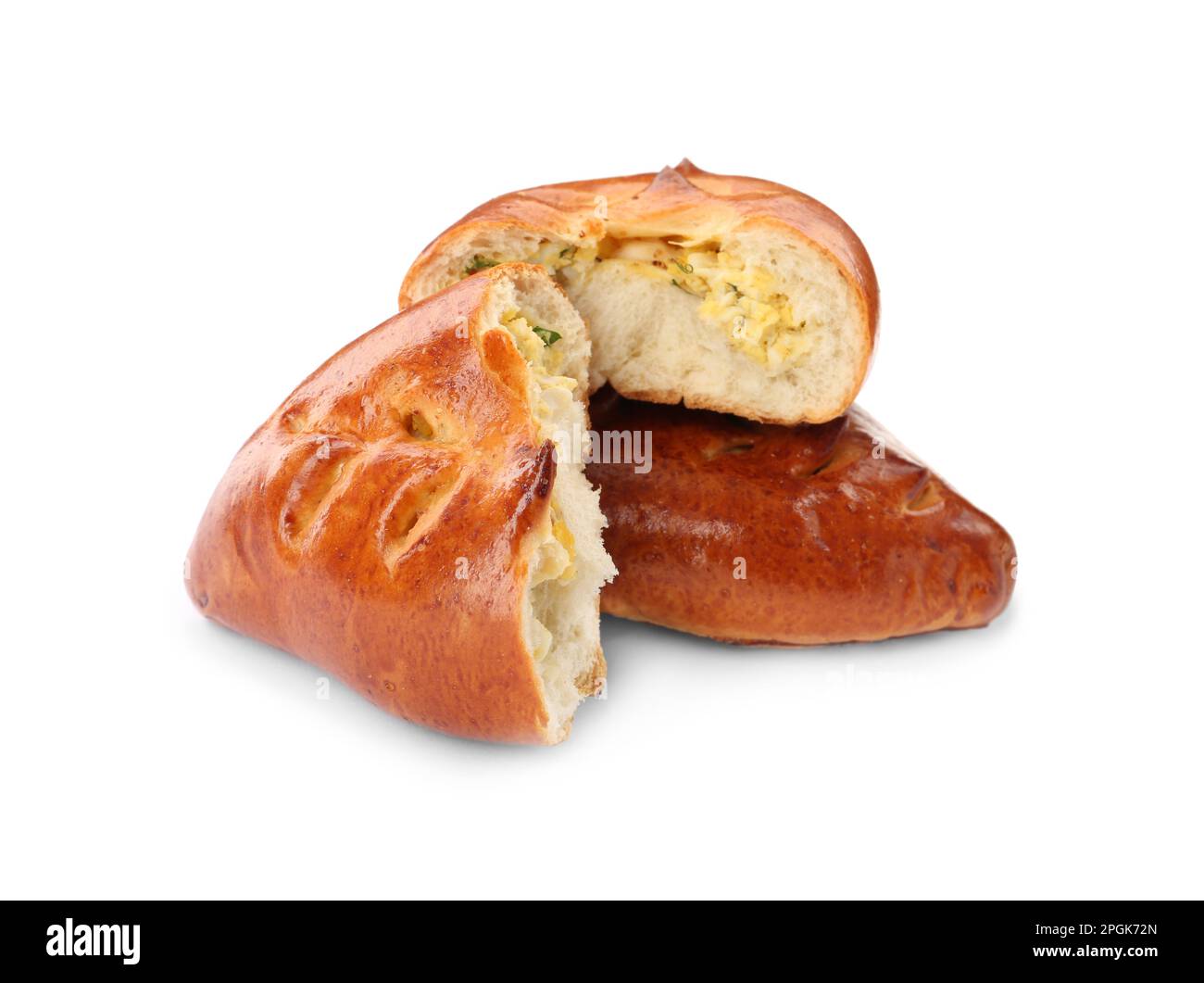Delicious baked patties with eggs on white background Stock Photo - Alamy