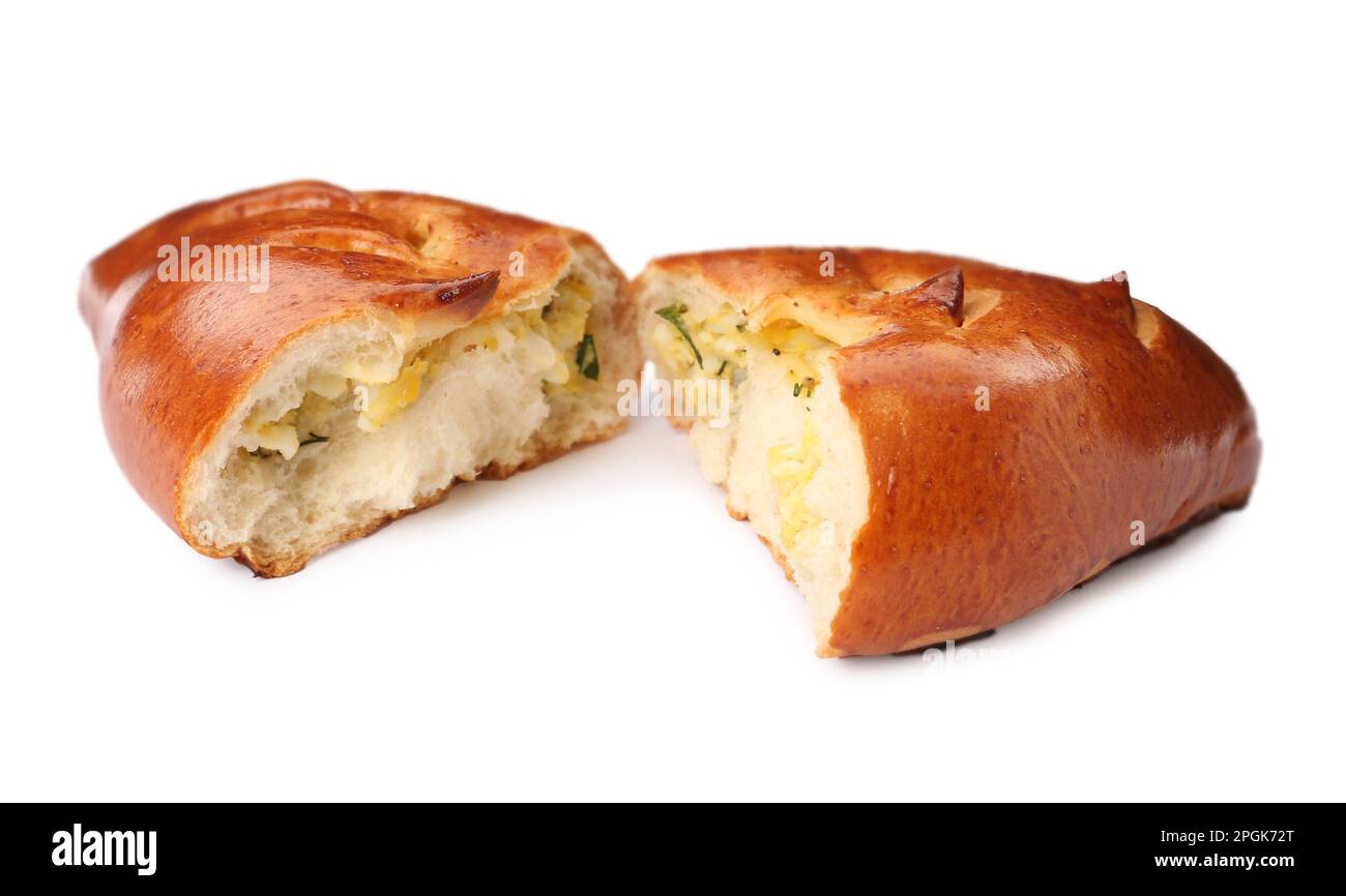 Delicious baked patty with egg on white background Stock Photo - Alamy