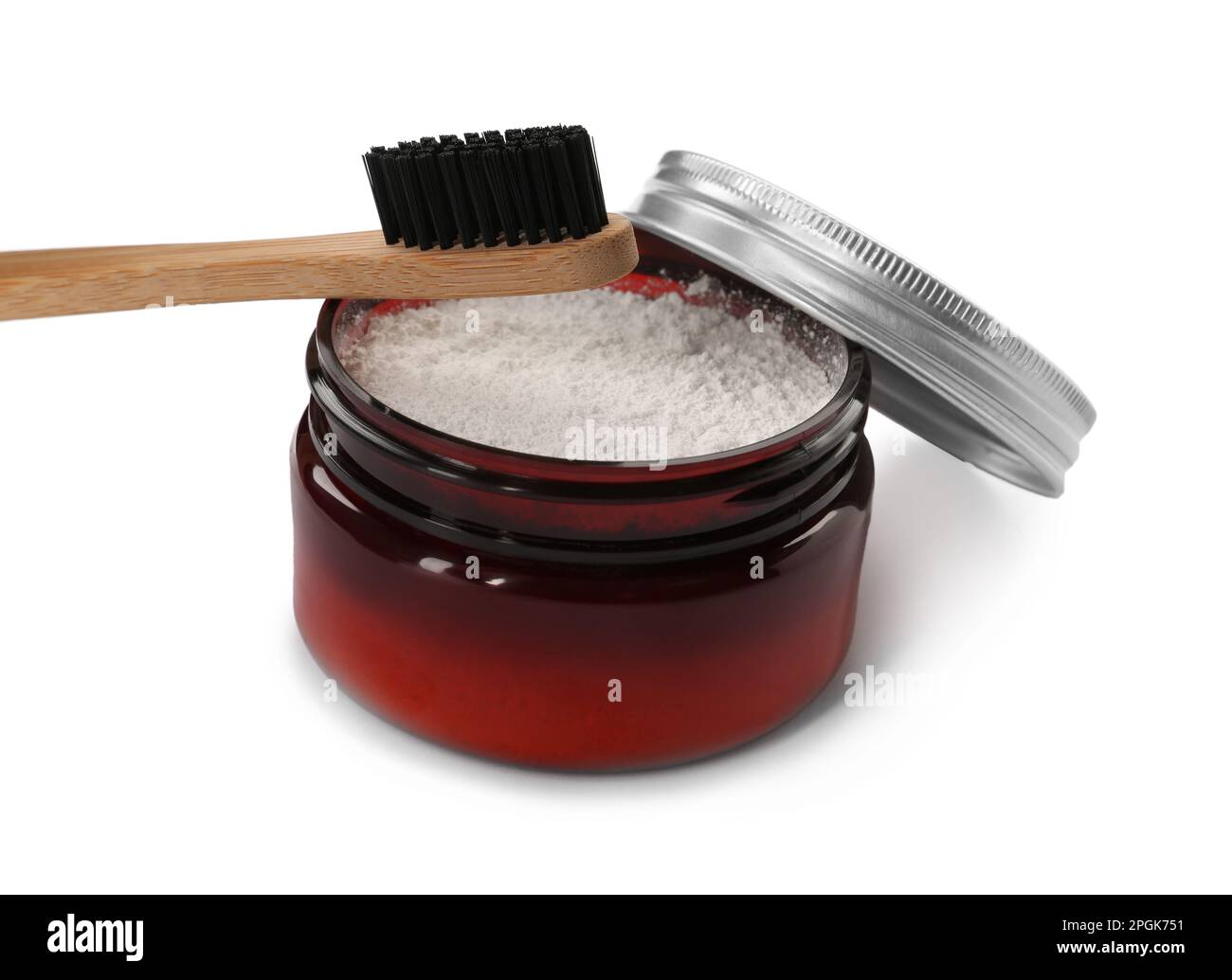 Jar of tooth powder and brush on white background Stock Photo - Alamy