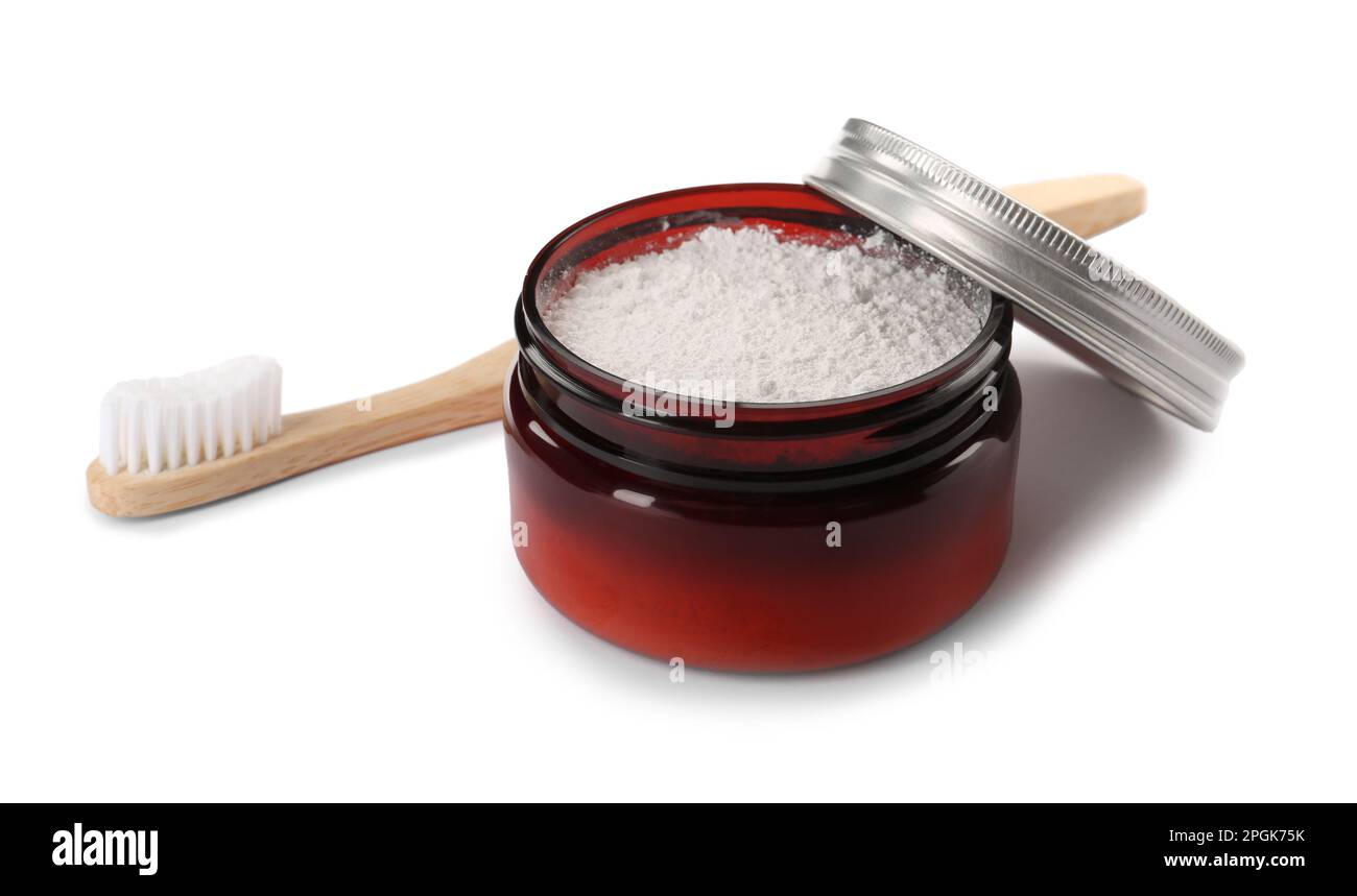 Jar of tooth powder and brush on white background Stock Photo - Alamy