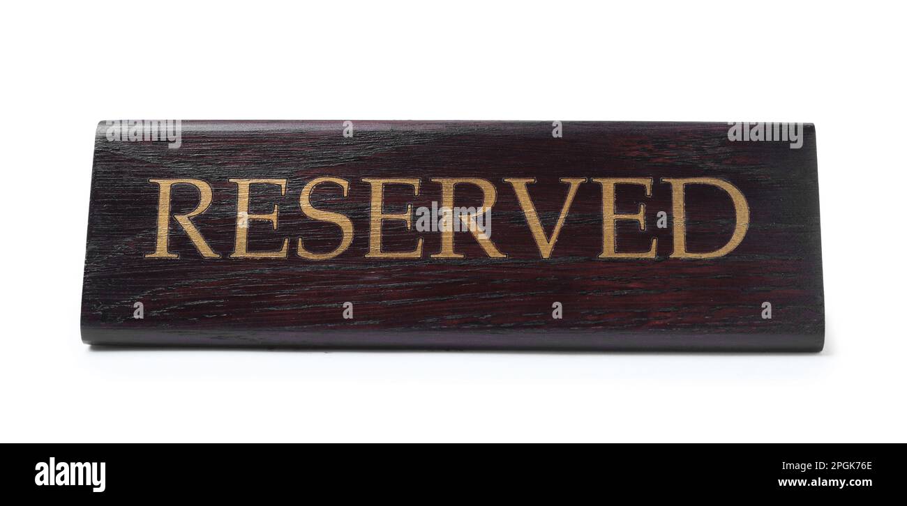Elegant wooden Reserved table sign isolated on white Stock Photo - Alamy