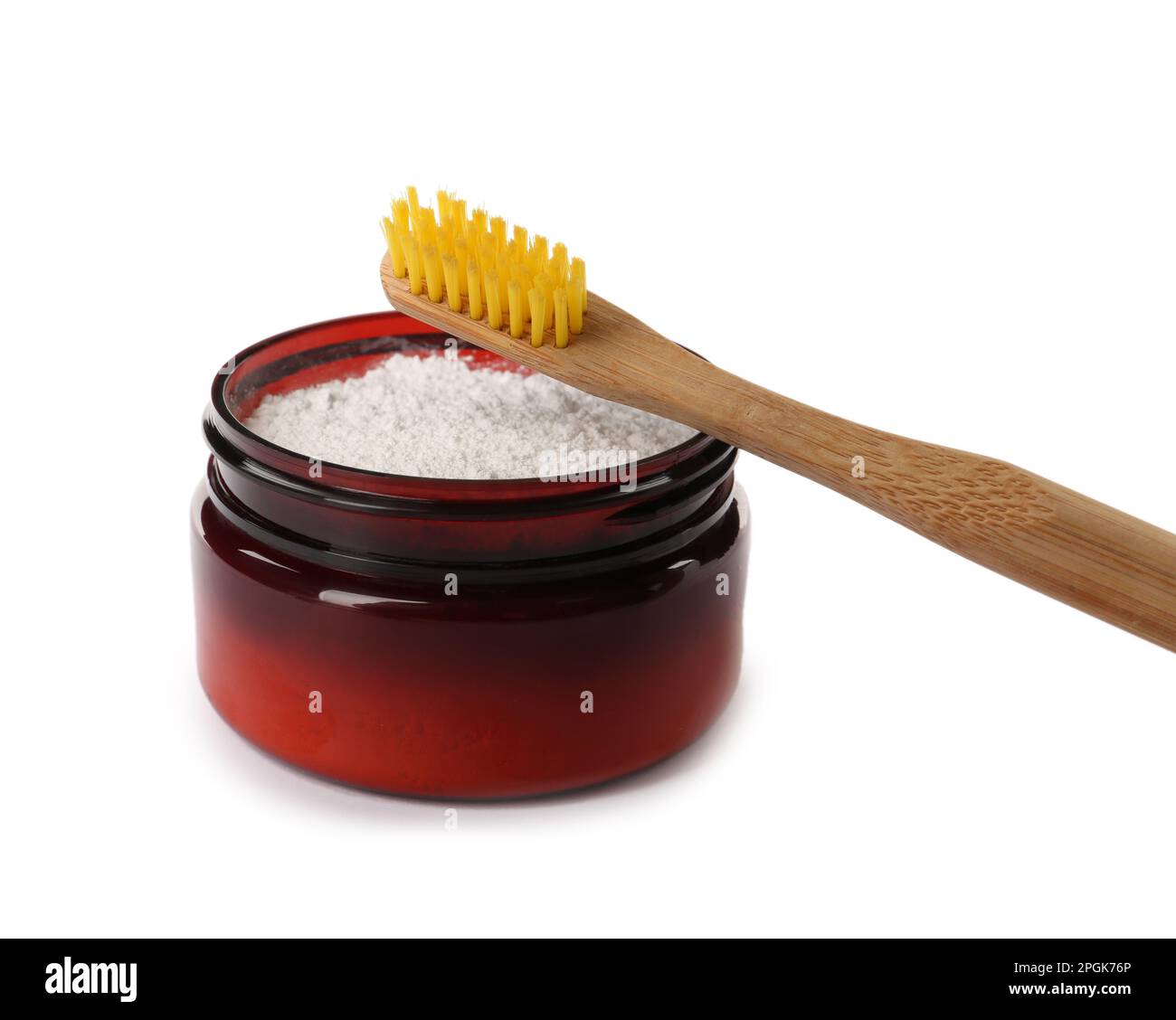 Jar of tooth powder and brush on white background Stock Photo - Alamy