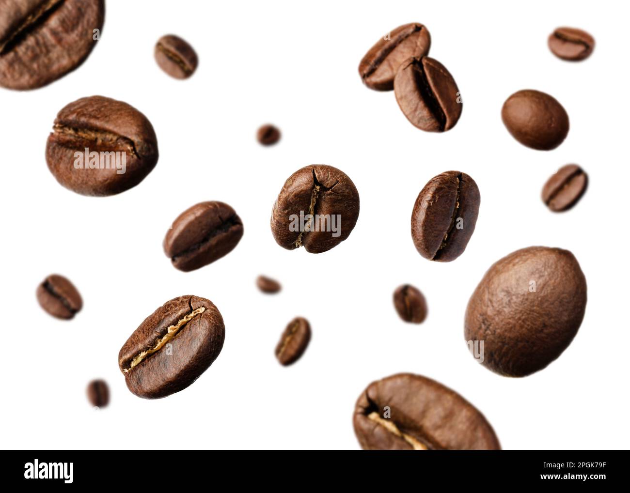 Many roasted coffee beans flying on white background Stock Photo - Alamy