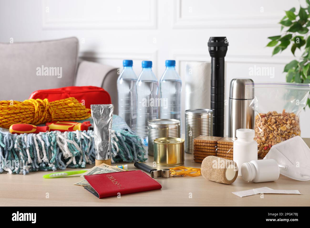 Disaster supply kit for earthquake on wooden table at home Stock Photo ...