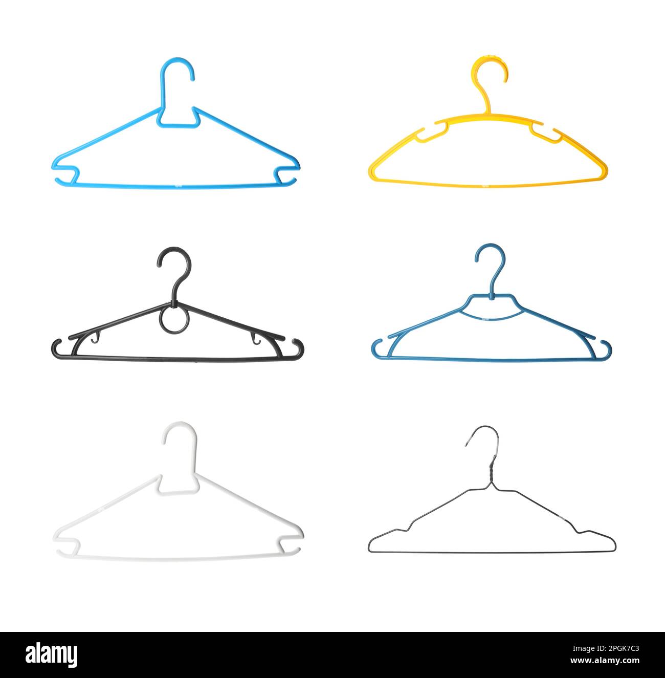 Set with different empty hangers on white background Stock Photo - Alamy