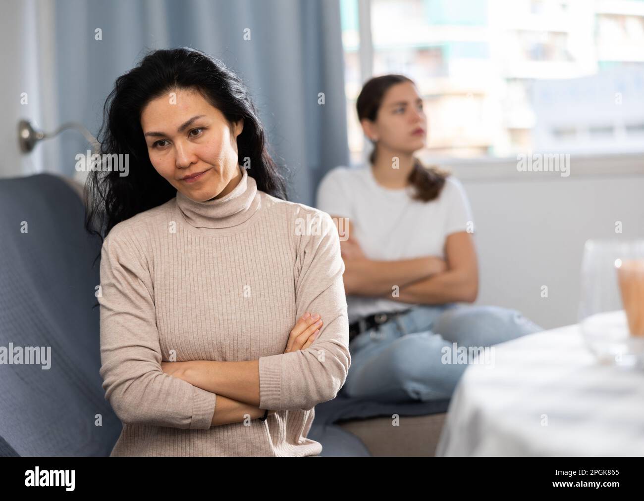 Two women having quarrel at home Stock Photo - Alamy