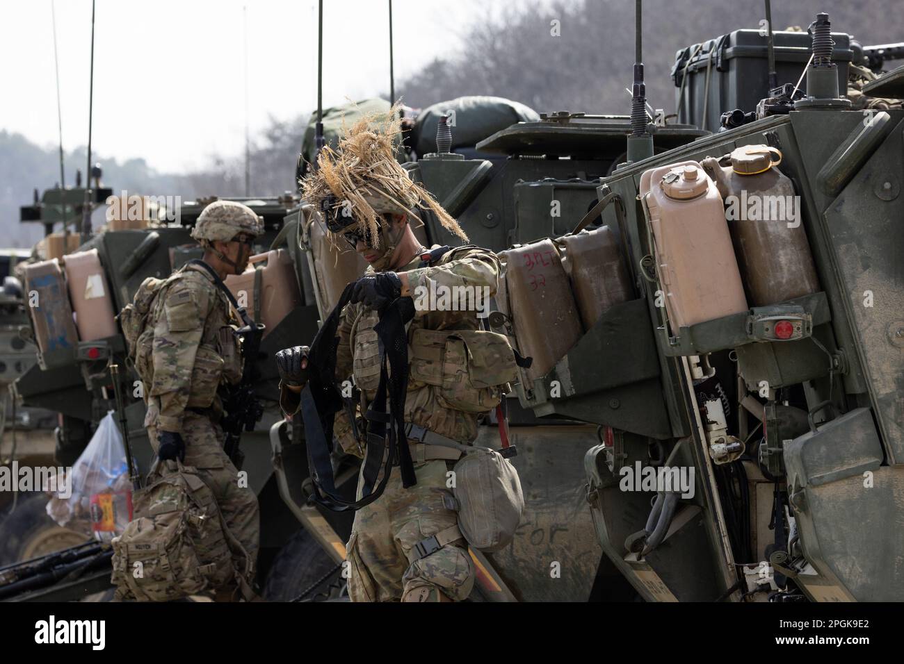U.S. soldiers from the 2nd Infantry Division, Stryker Battalion prepare ...