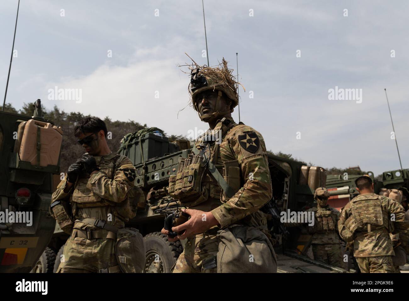 U.S. soldiers from the 2nd Infantry Division, Stryker Battalion prepare ...