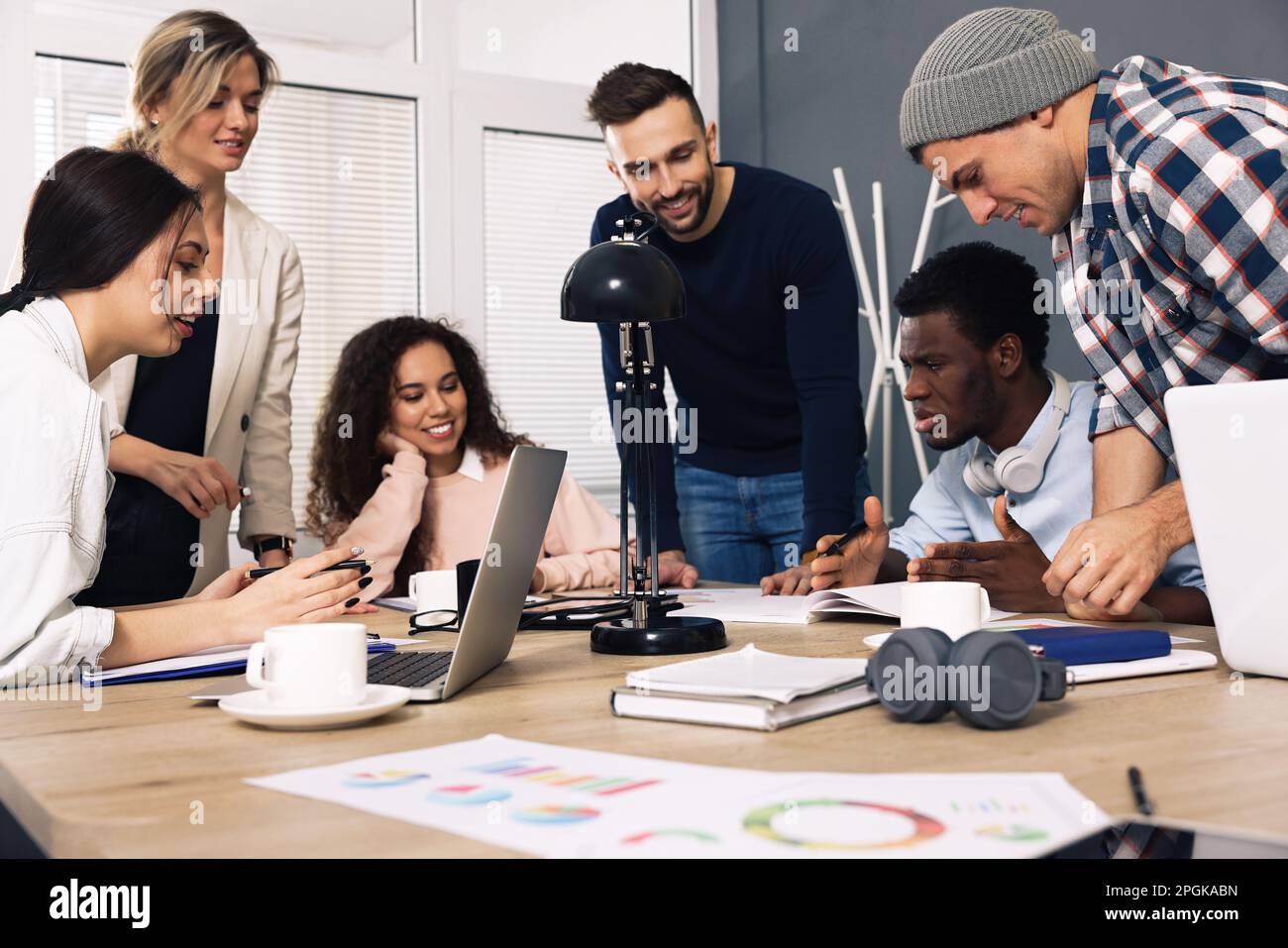 Team of employees working together in office. Startup project Stock ...