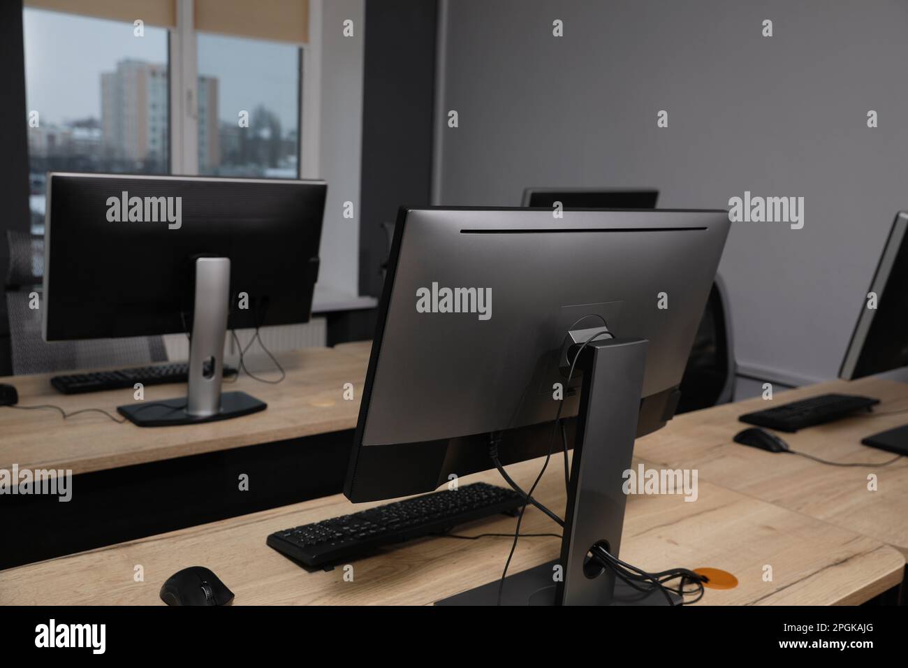 Rows of computers in empty office hi-res stock photography and images ...