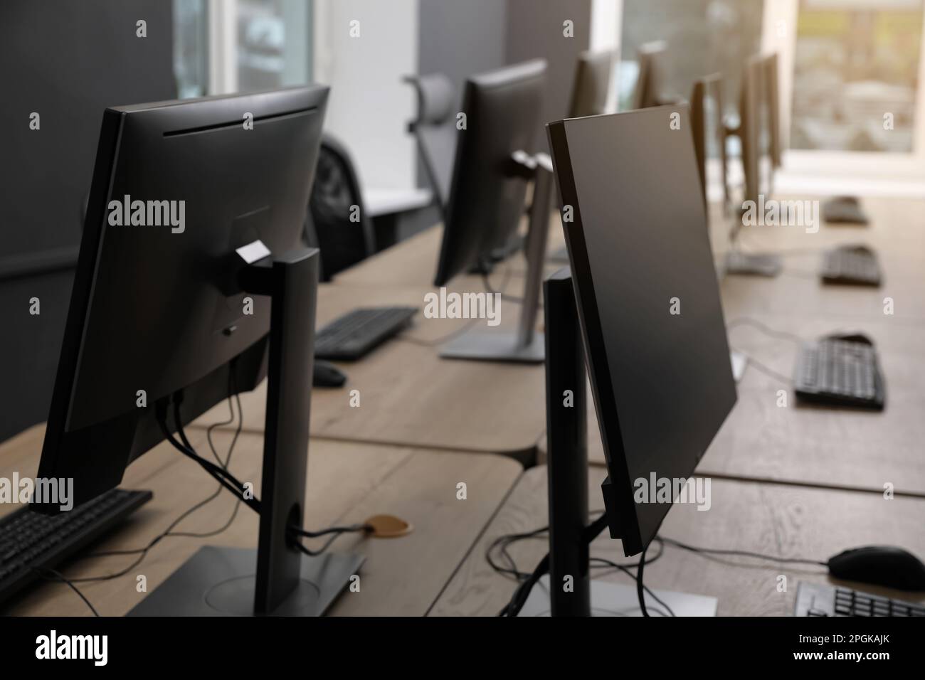 Many modern computers in open space office Stock Photo - Alamy