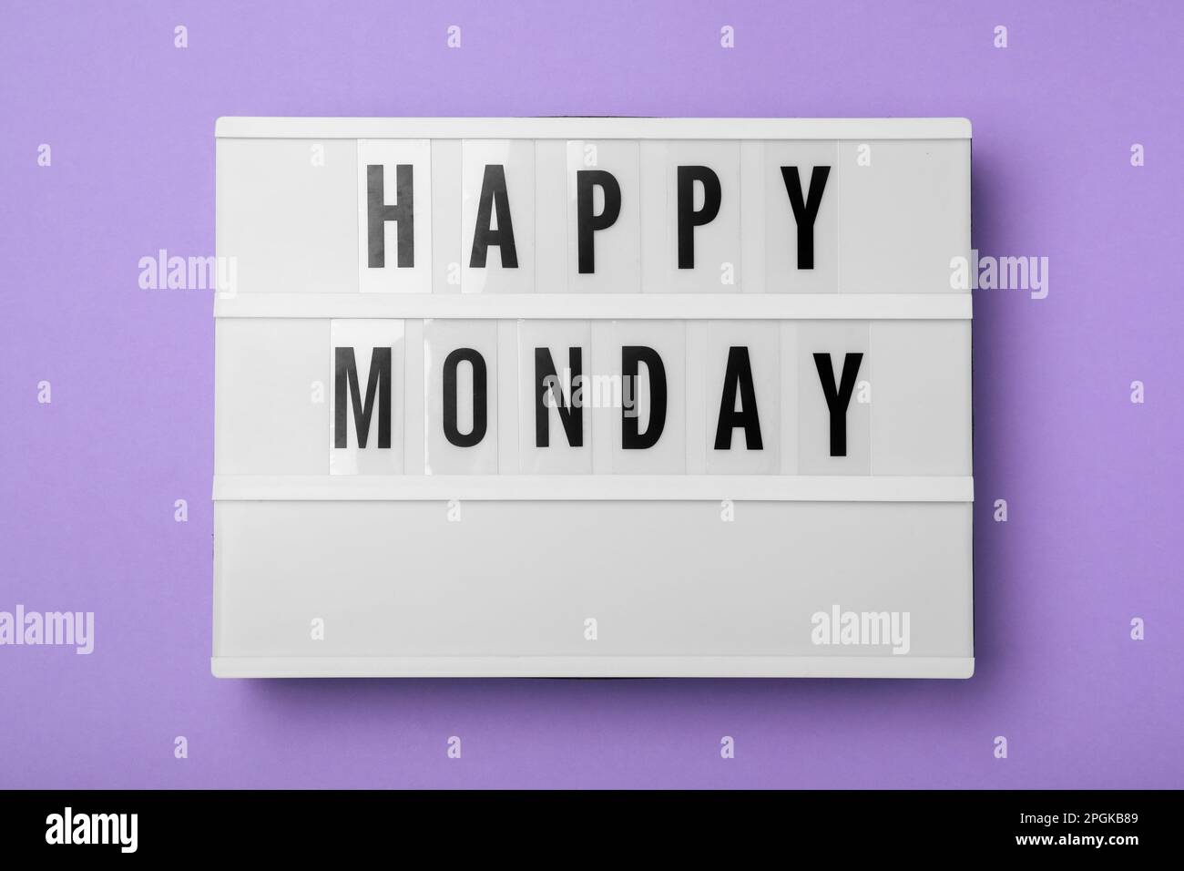 Light box with message Happy Monday on lilac background, top view Stock ...