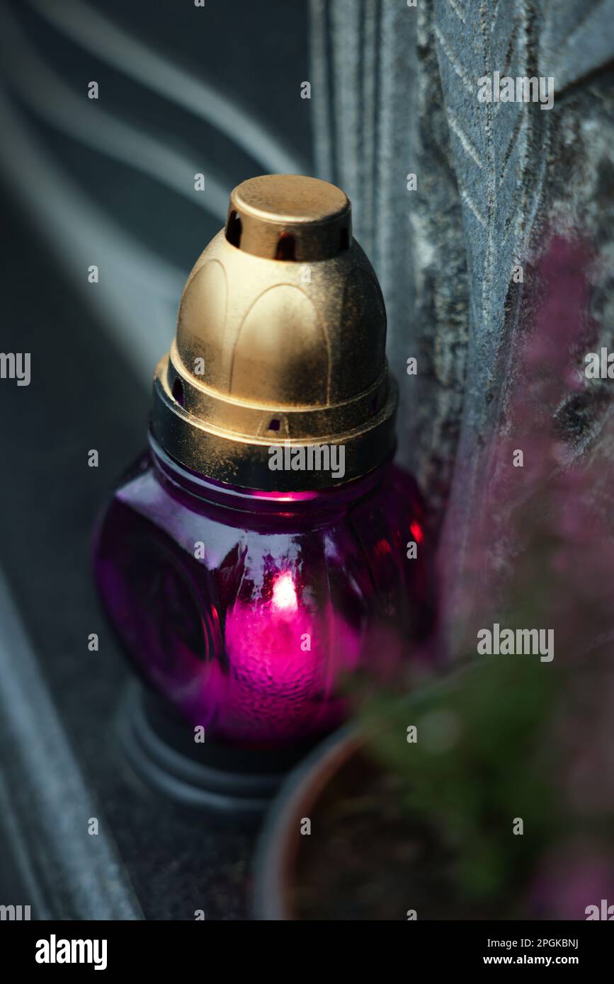 Grave light on granite tombstone at cemetery, closeup Stock Photo - Alamy