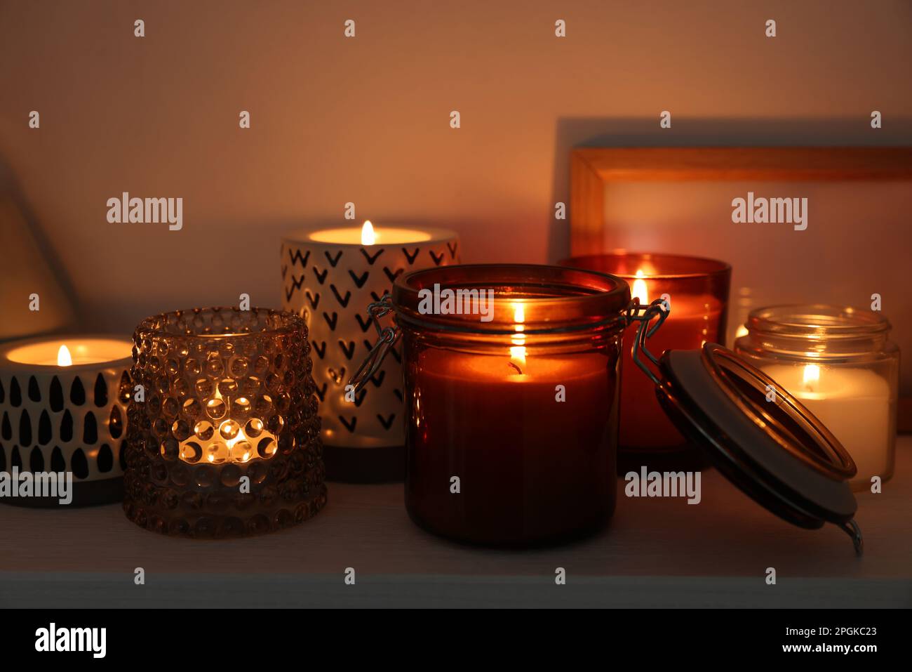 Burning wax candles hi-res stock photography and images - Alamy