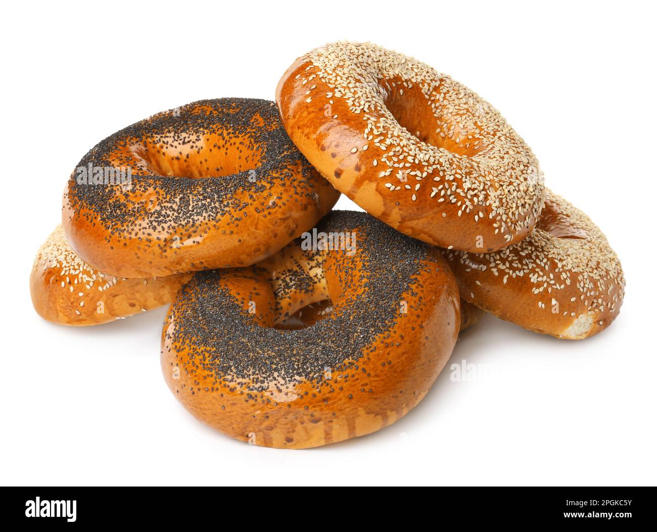 Many delicious fresh bagels on white background Stock Photo - Alamy