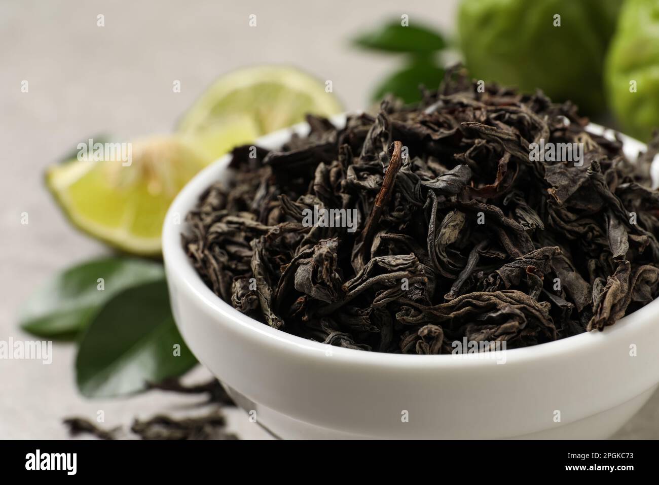 Dry bergamot tea leaves in bowl, closeup Stock Photo - Alamy