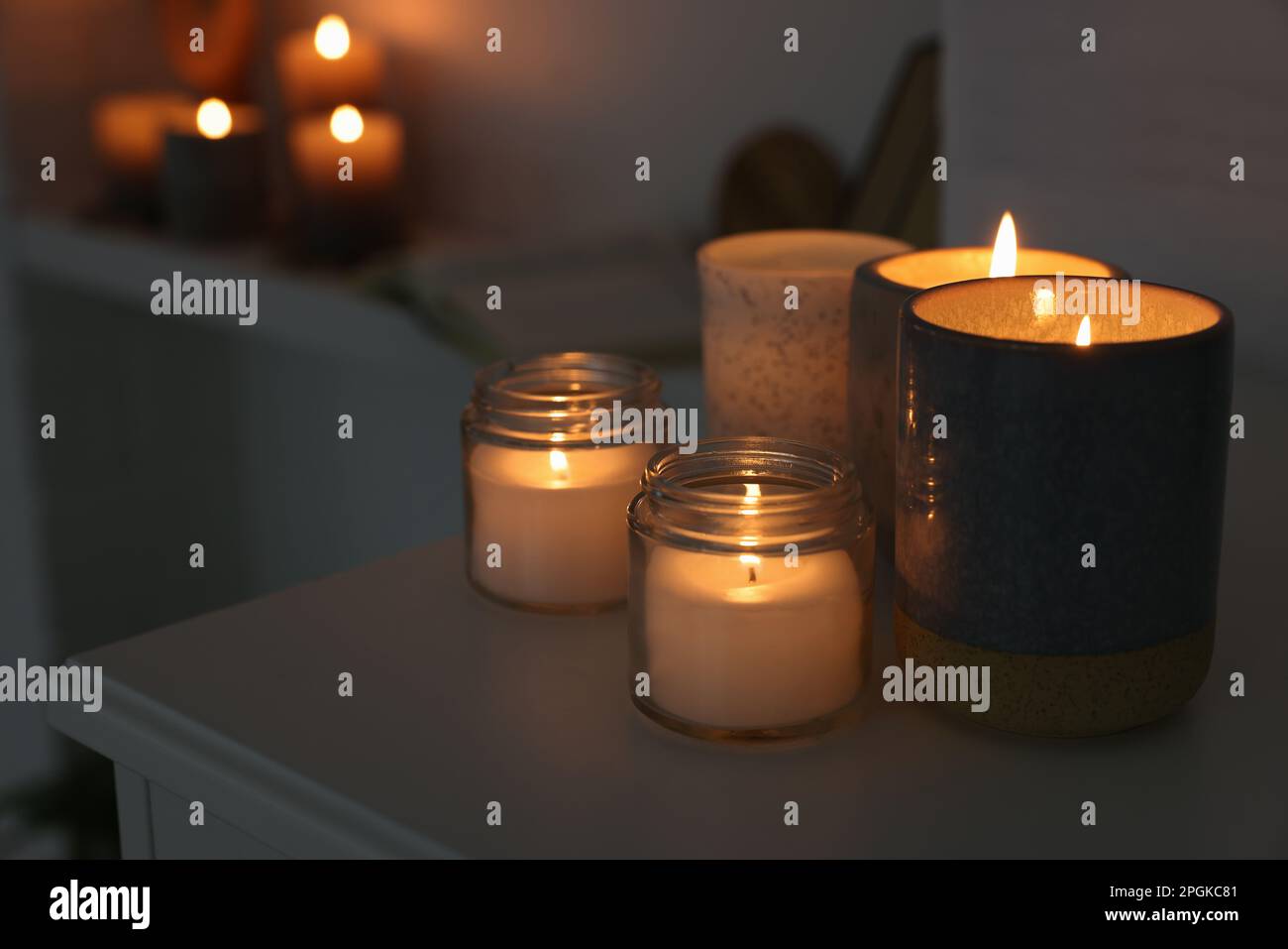 Lots of candles in home hi-res stock photography and images - Alamy