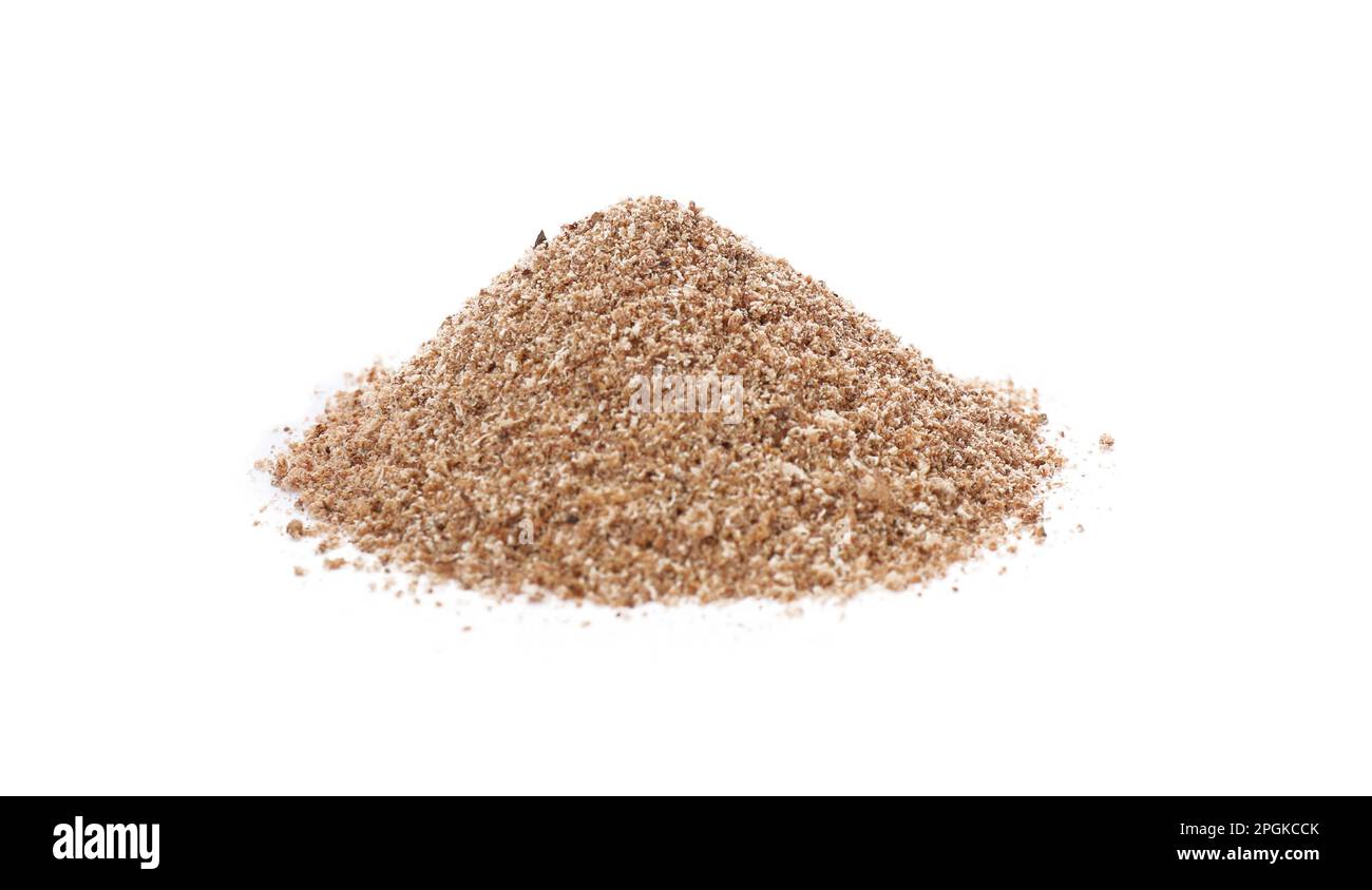 Heap of nutmeg powder on white background Stock Photo - Alamy