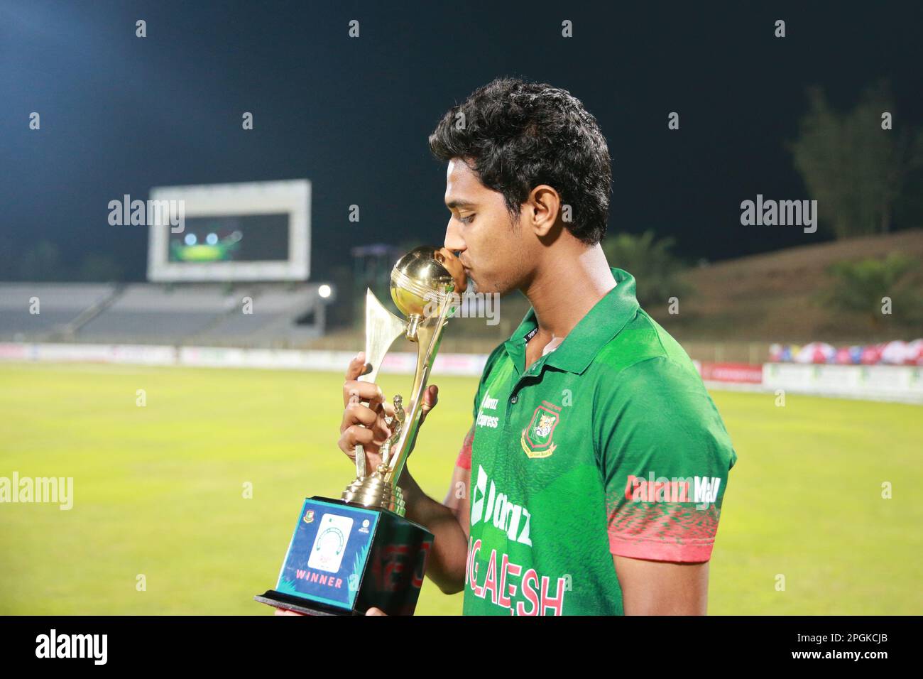 Hasan Mahmud along the trophyafter the Bangladesh-Ireland 3rd ODI match ...