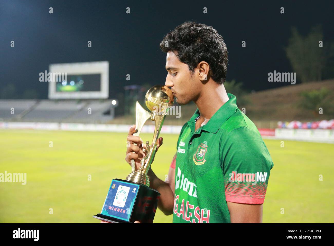 Hasan Mahmud along the trophyafter the Bangladesh-Ireland 3rd ODI match ...