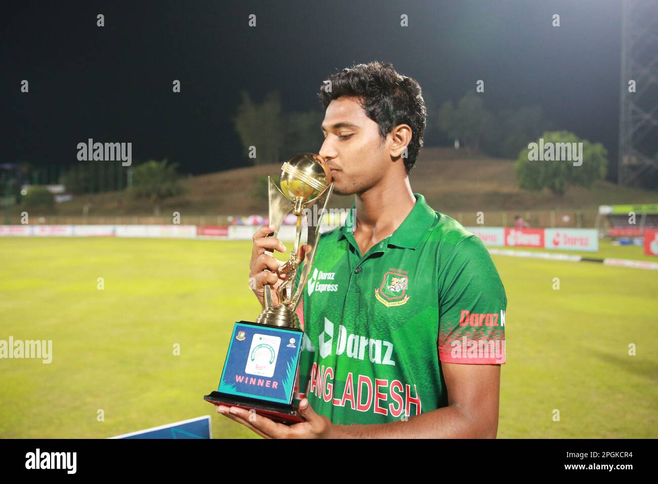 Hasan Mahmud along the trophyafter the Bangladesh-Ireland 3rd ODI match ...