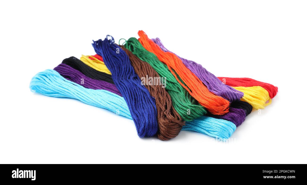 Set of colorful embroidery threads on white background Stock Photo - Alamy