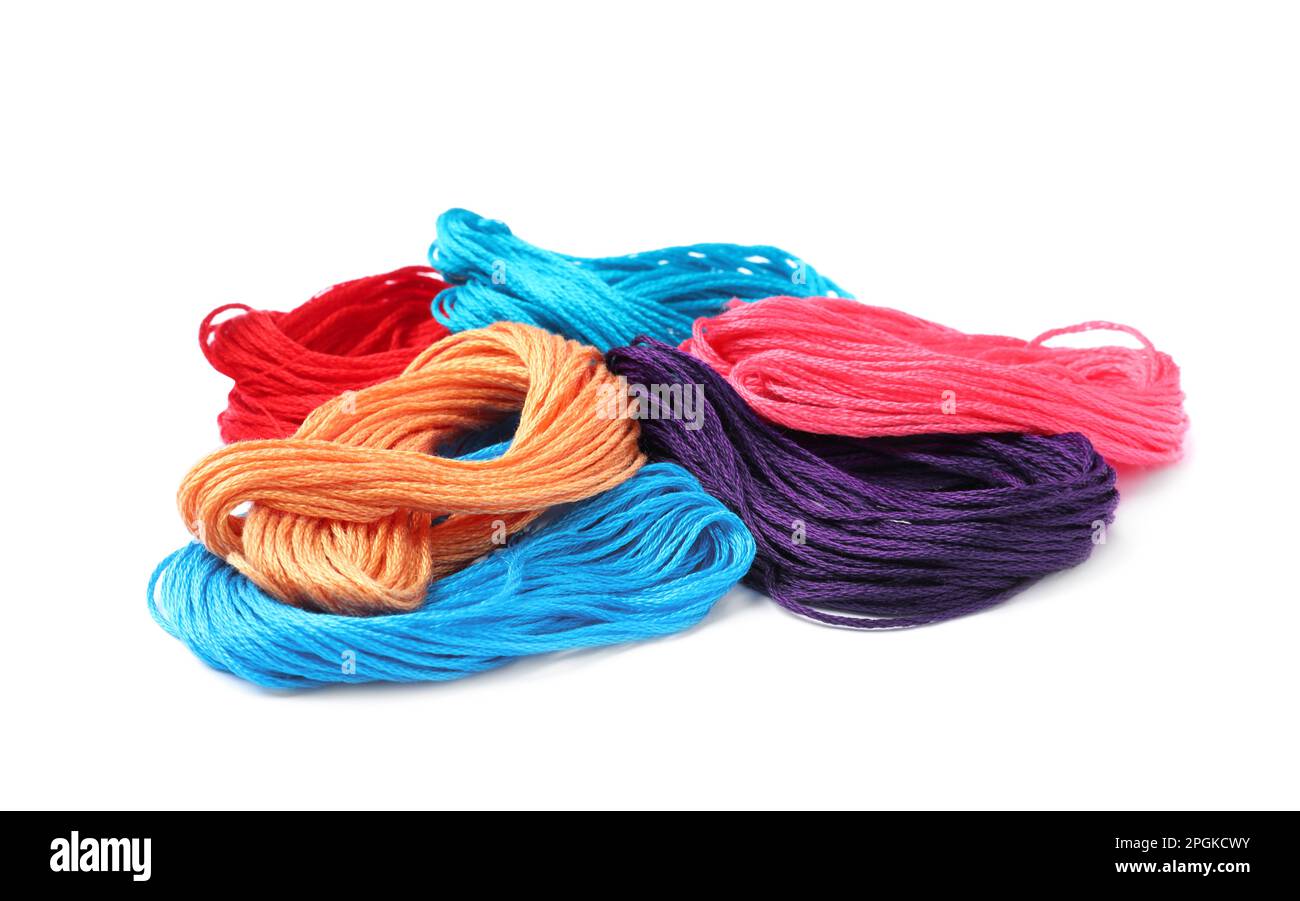 Set of colorful embroidery threads on white background Stock Photo - Alamy