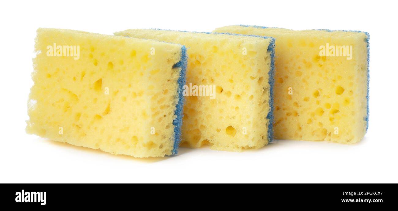 Yellow cleaning sponges with abrasive light blue scourers on white ...