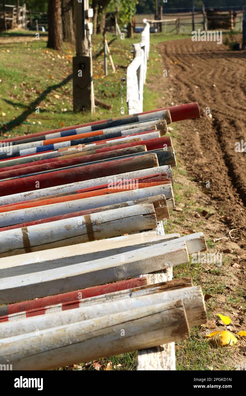 Colorful hurdles obstacles barriers in row at an equestrian centre ...