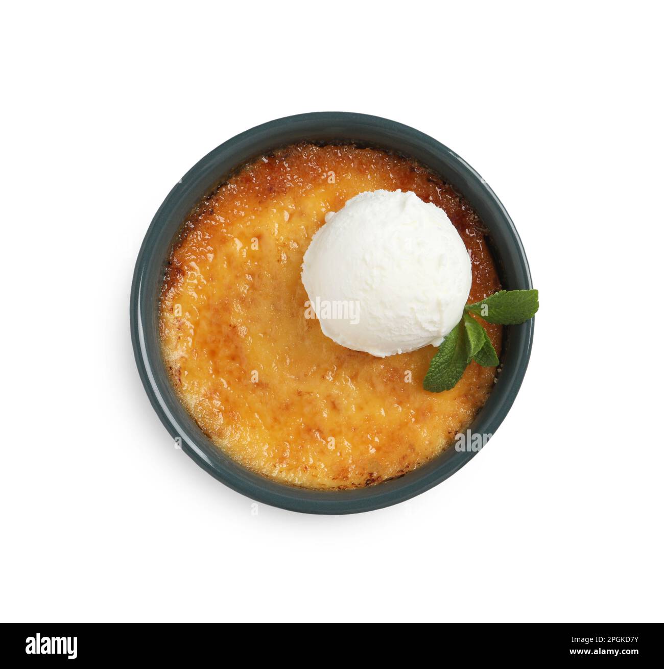 Delicious creme brulee with scoop of ice cream and mint isolated on ...