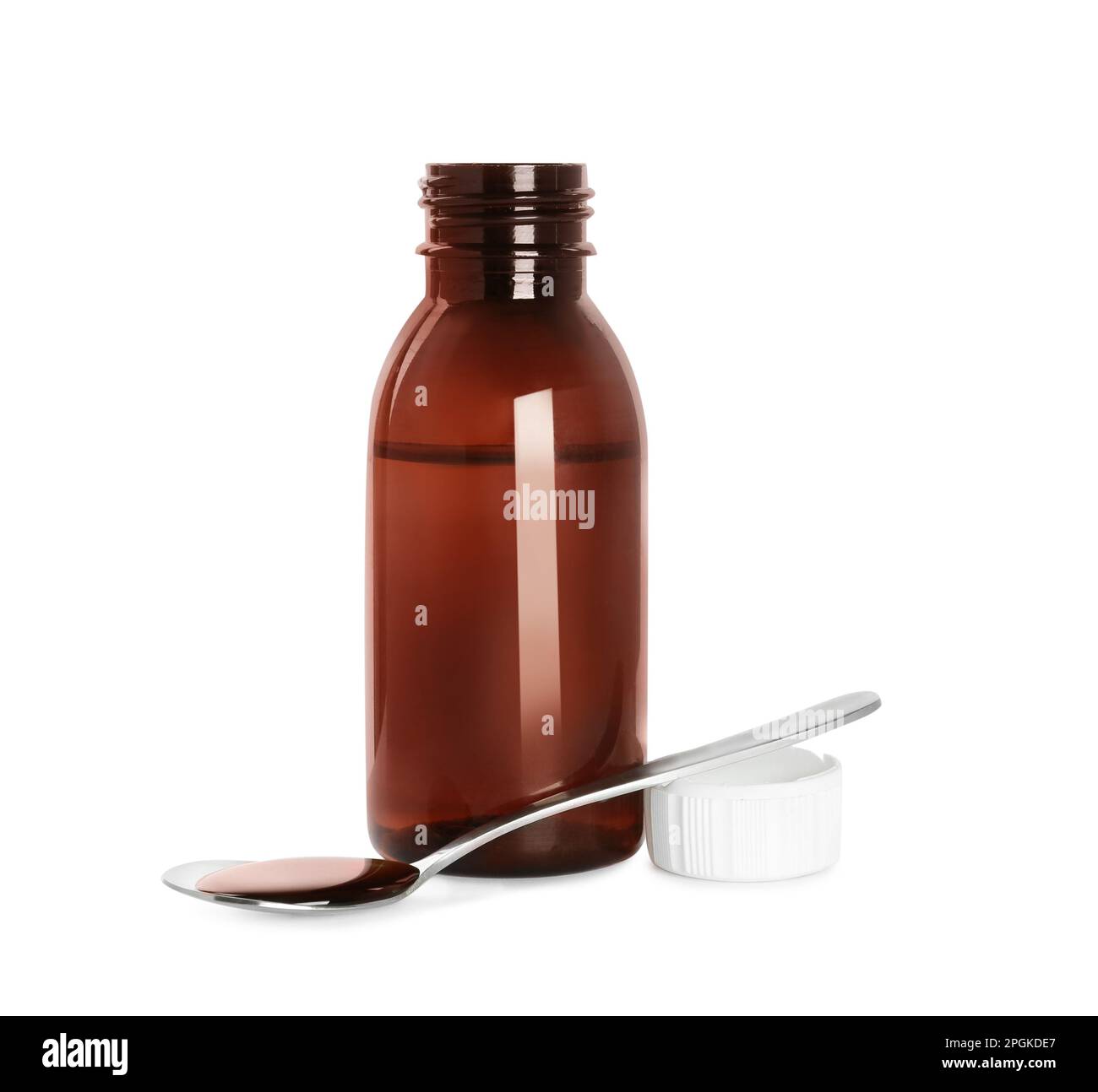 Bottle of cough syrup and spoon on white background Stock Photo - Alamy