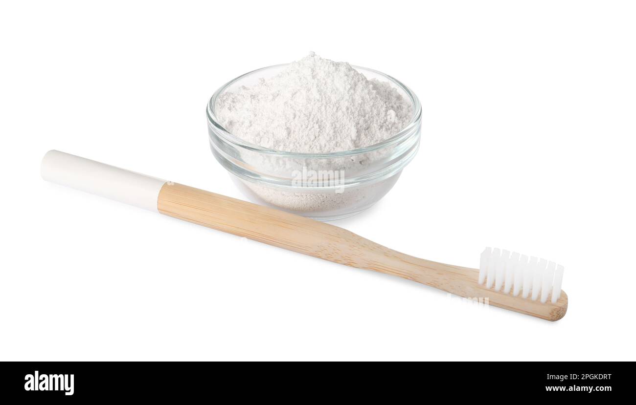 Glass bowl of tooth powder and brush on white background Stock Photo ...