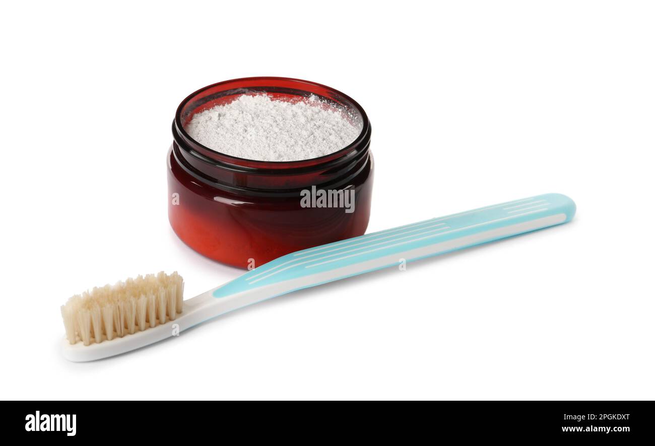 Jar of tooth powder and brush on white background Stock Photo - Alamy