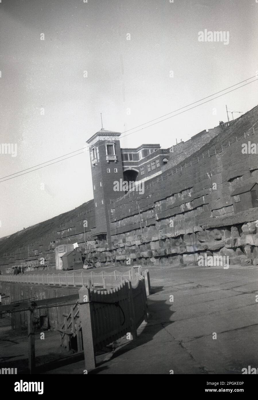 1950s, historical, concrete seawall and walkway below, Bridlington ...
