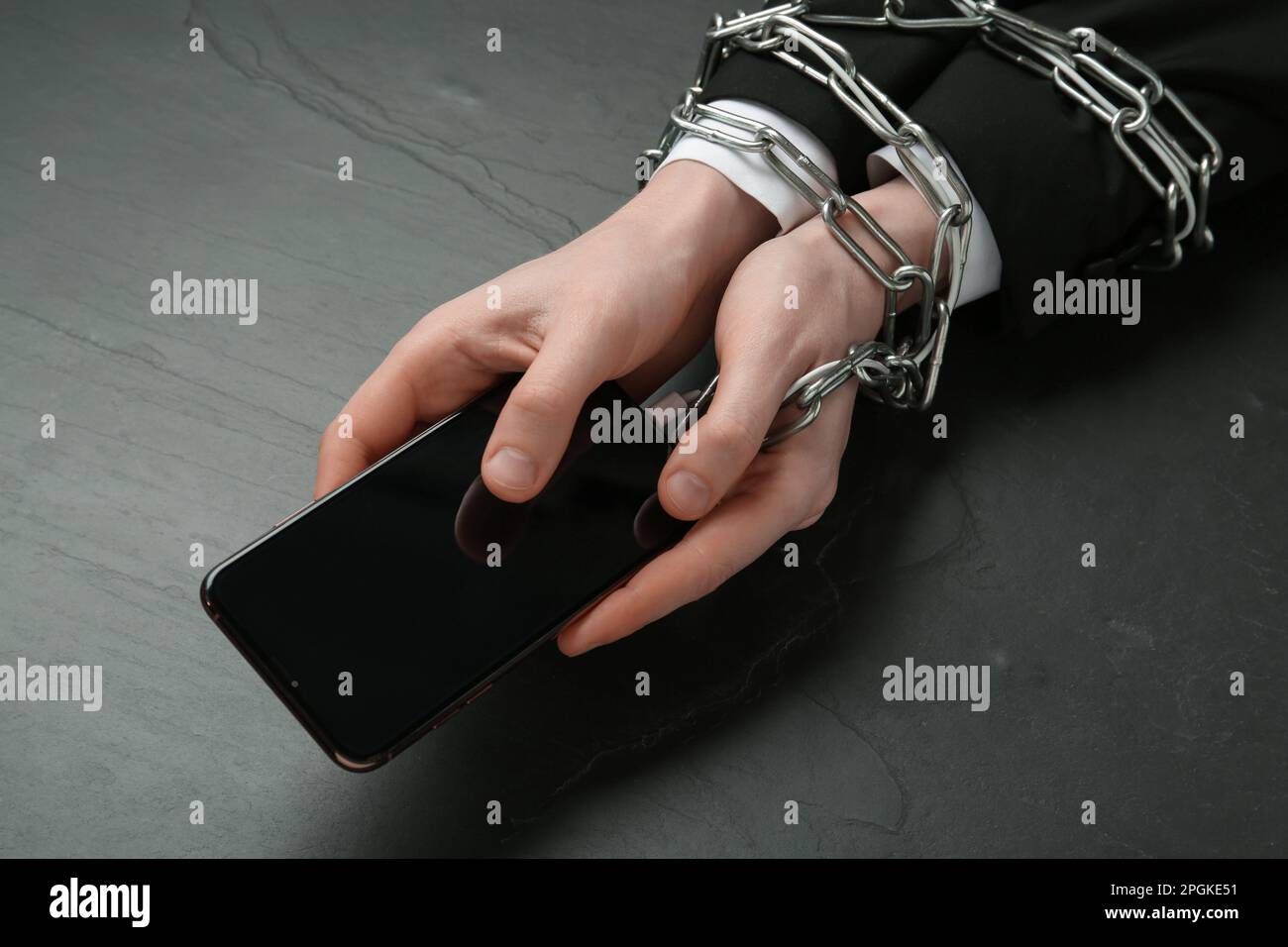 Man chained office hi-res stock photography and images - Alamy