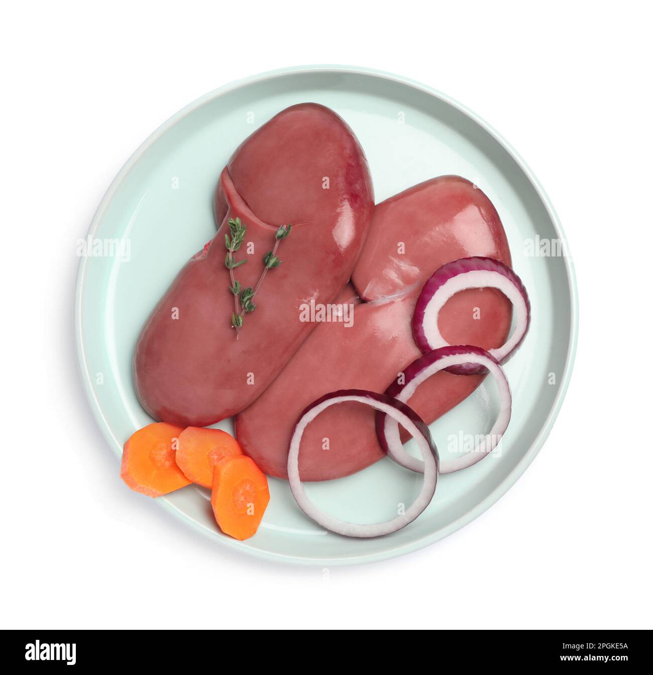 Fresh raw kidneys with thyme, onion and carrot on white background, top ...