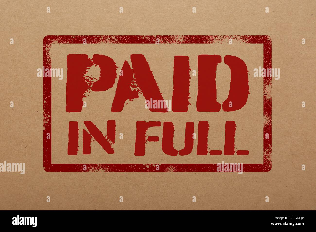 Kraft paper with stamp PAID IN FULL, top view Stock Photo - Alamy