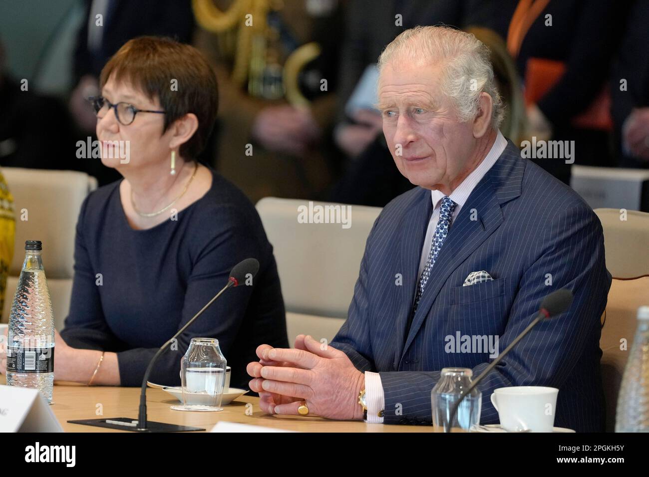 King Charles III sits beside President Odile Renaud-Basso during a ...