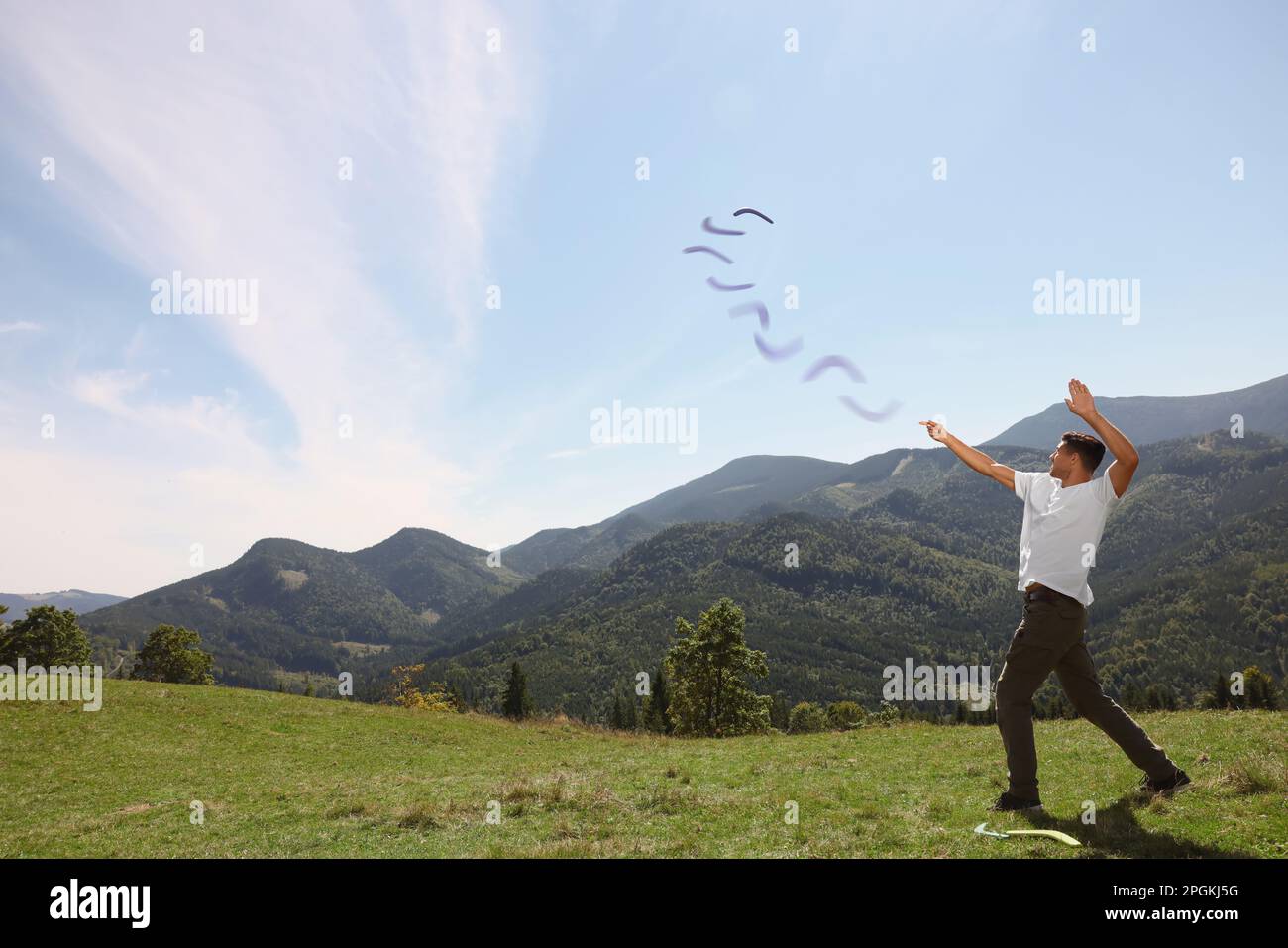 Hand holding boomerang hi-res stock photography and images - Alamy