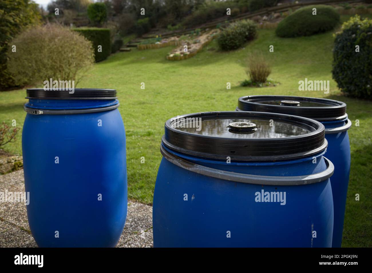 view of water collectors in a garden in France Stock Photo - Alamy