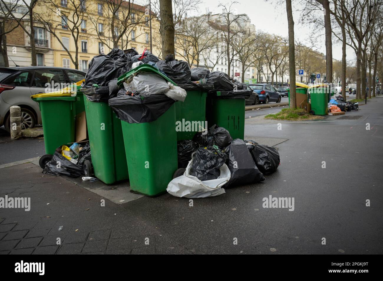 view of bins overflowing with rubbish following the garbage collectors ...