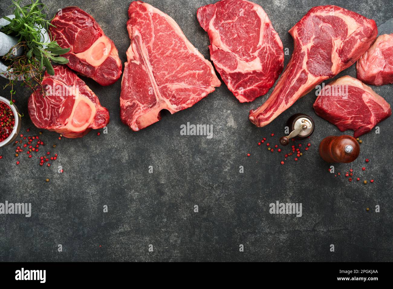 Raw prime steaks. Variety of fresh black angus prime meat steaks T-bone ...