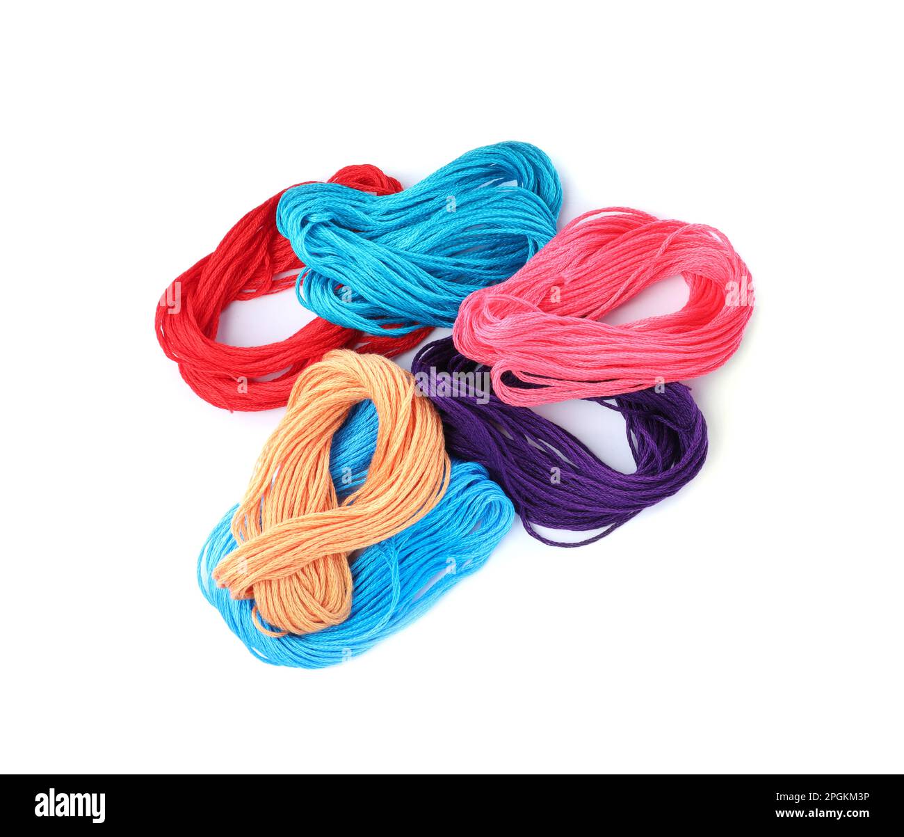 Set of colorful embroidery threads on white background, top view Stock ...