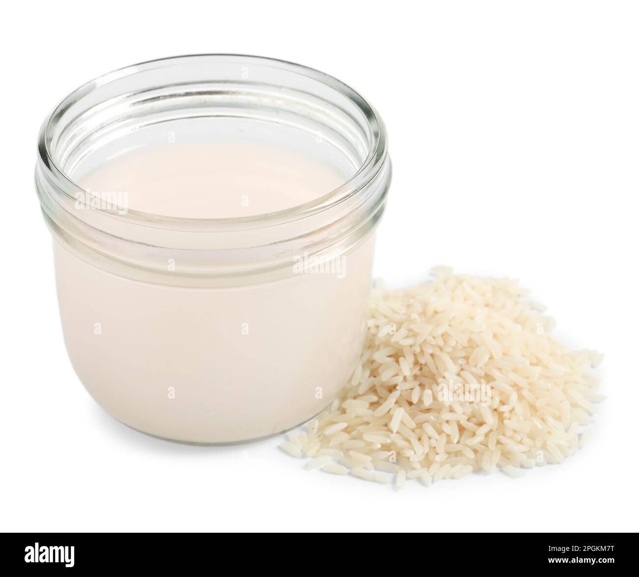 Homemade natural rice water and grains on white background Stock Photo ...