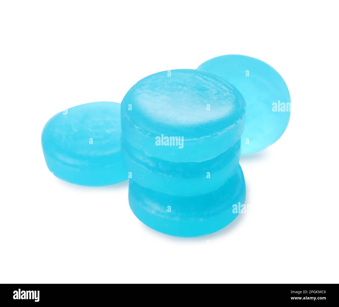 Many light blue cough drops on white background Stock Photo - Alamy