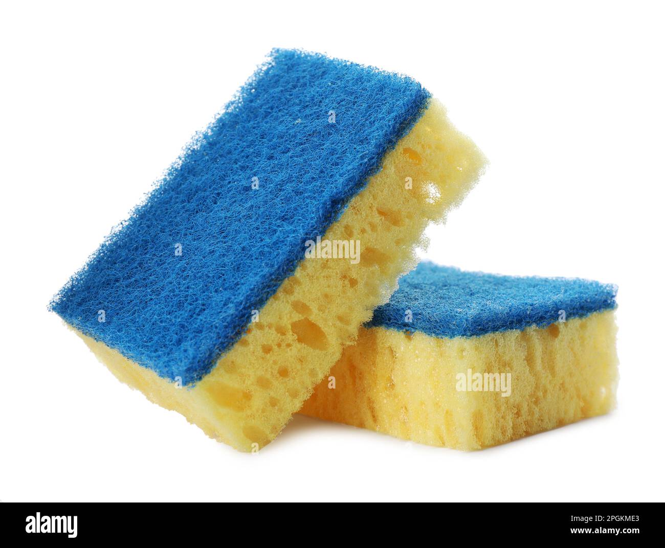 Yellow cleaning sponges with abrasive light blue scourers on white ...