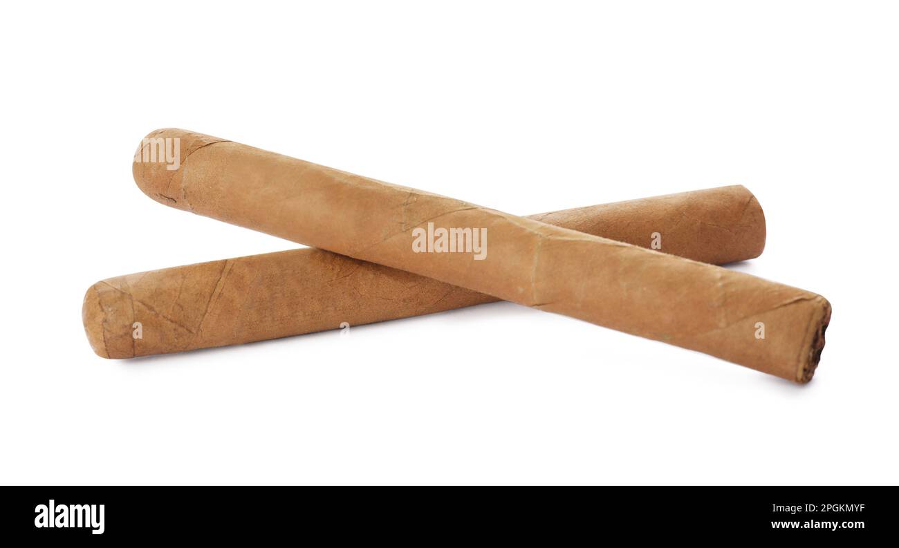 Two cigars on white background. Tobacco smoking Stock Photo - Alamy