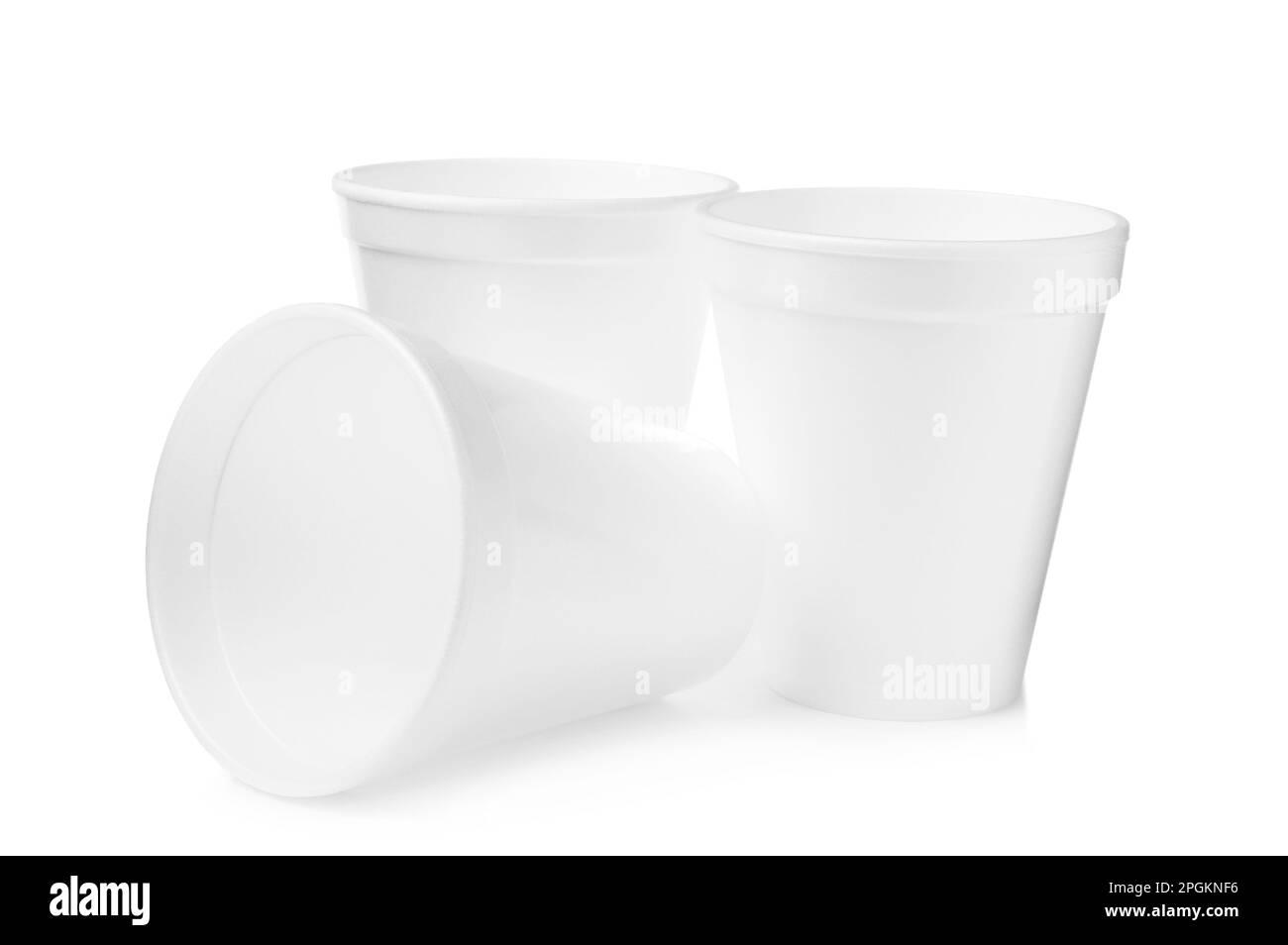Three clean styrofoam cups on white background Stock Photo - Alamy