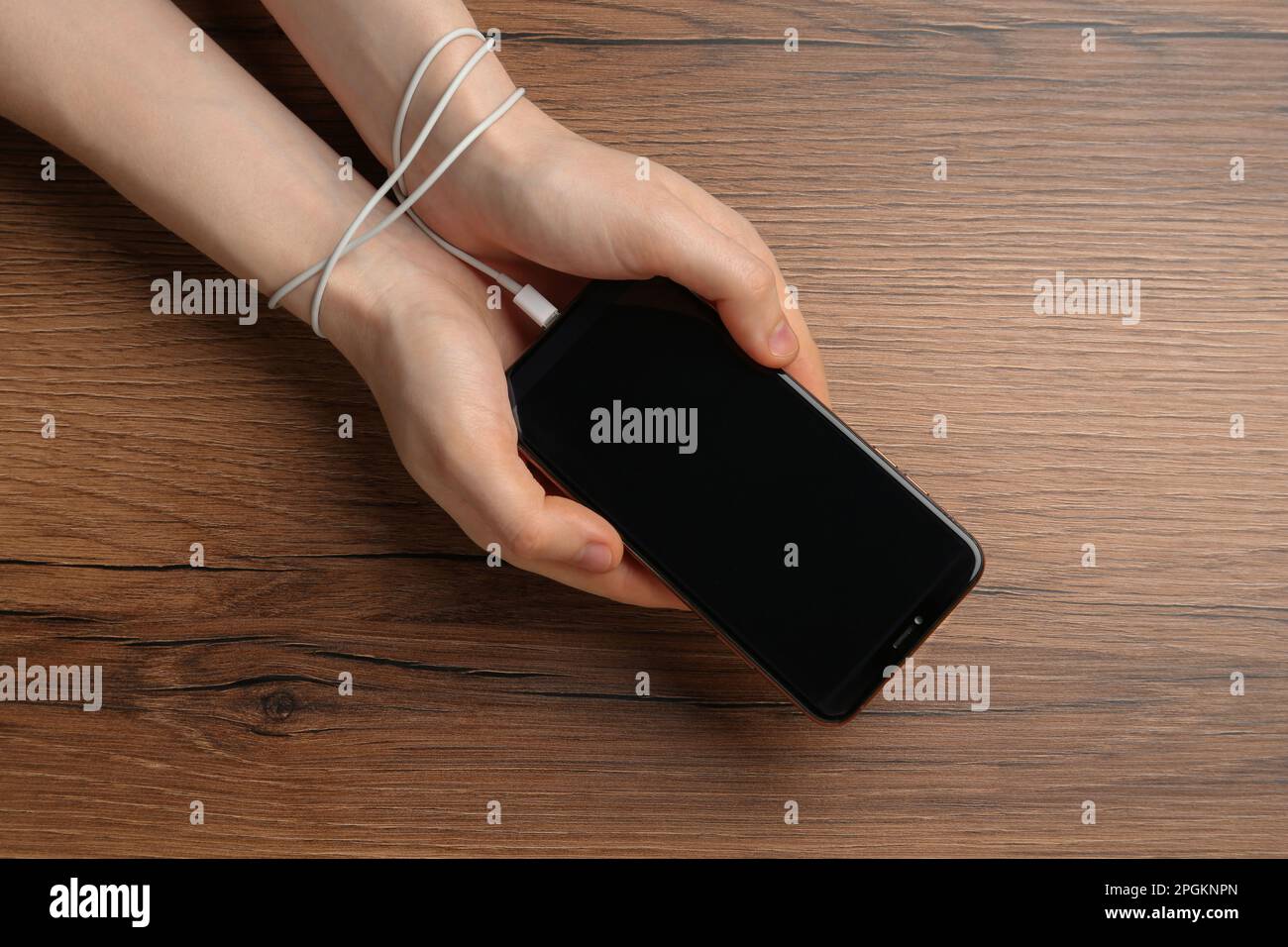 Woman tied to table hi-res stock photography and images - Alamy